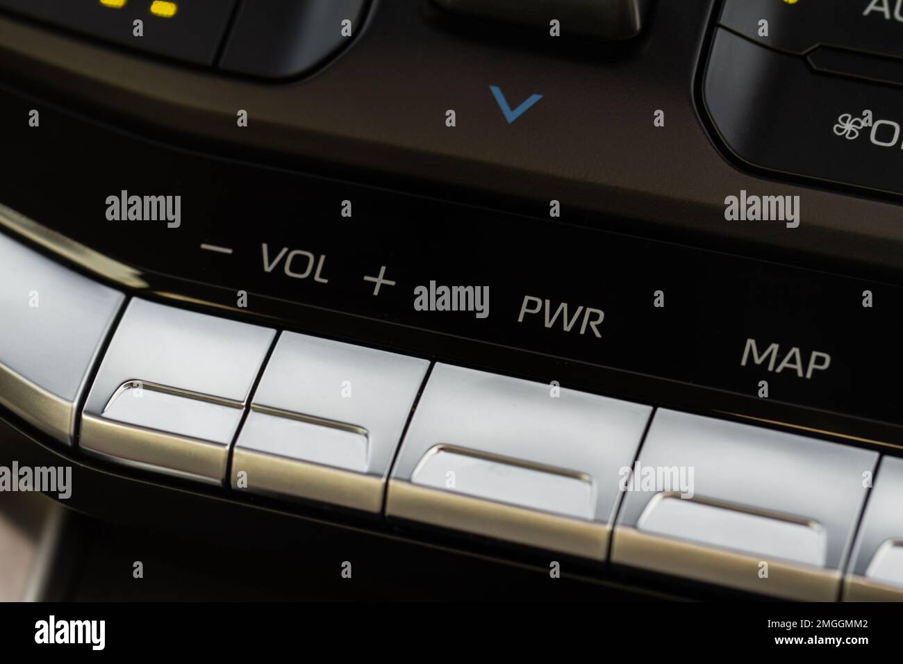 Car media controller close up. Modern car media and navigation control ...