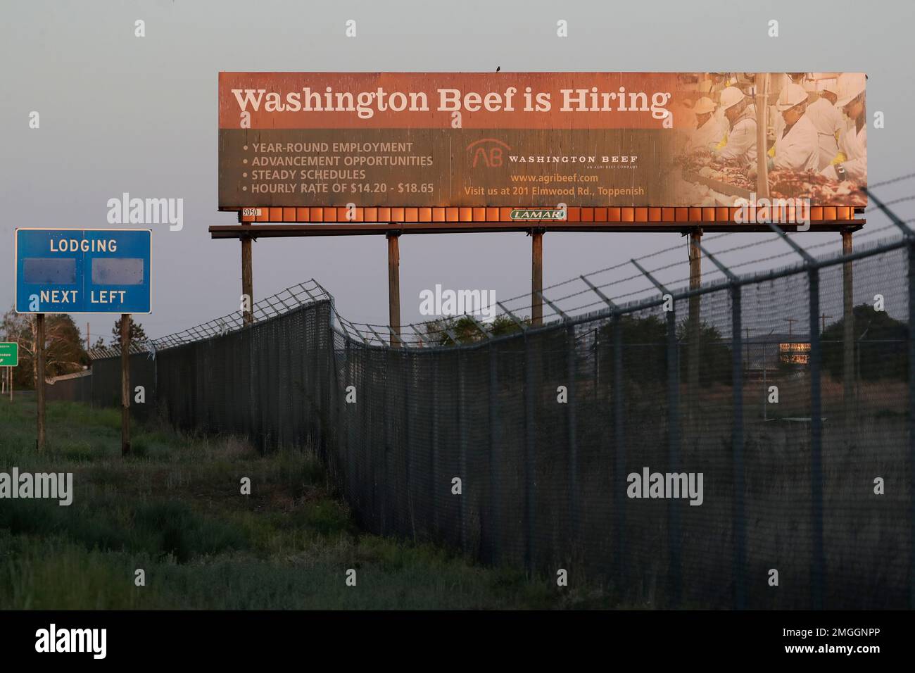A billboard advertises job hiring at Agri Beef's Washington Beef ...