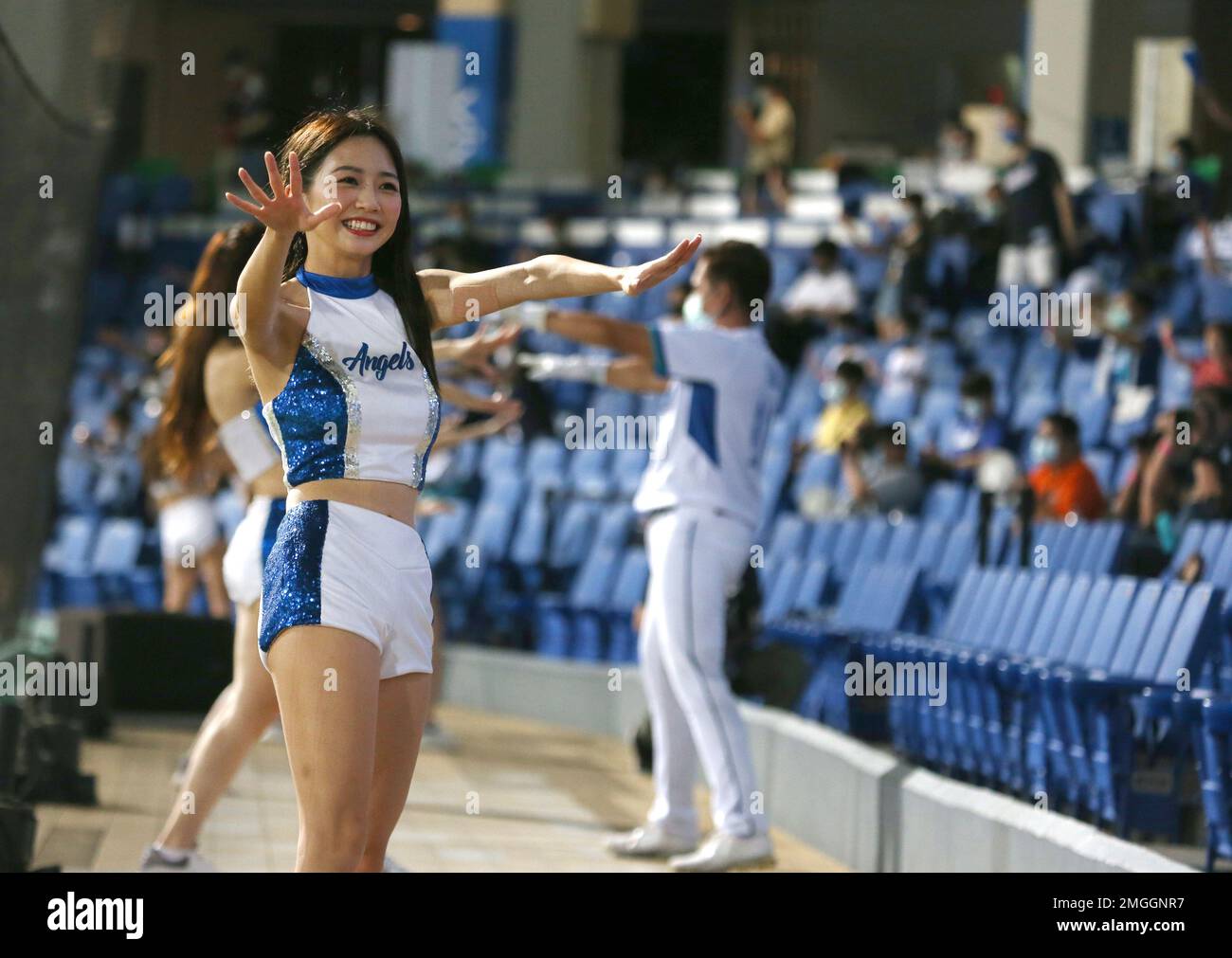 Cheerleaders cheer with fans at Xinzhuang Baseball Stadium in New ...