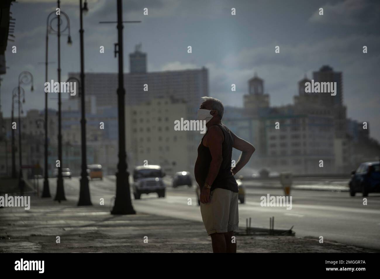 A man wearing a mask as a precaution against the spread of the new ...