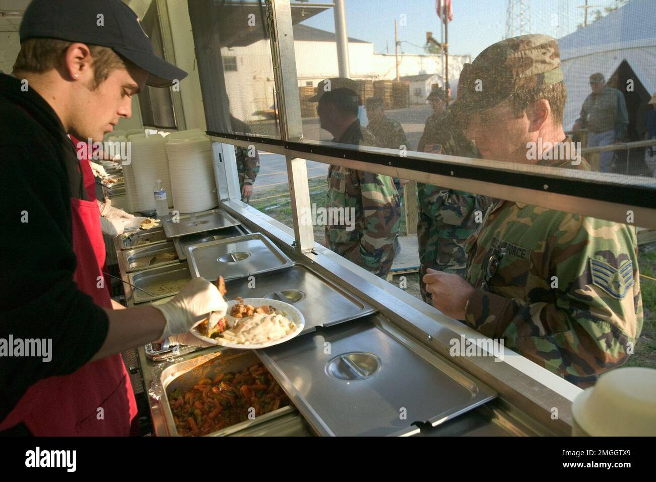 Base Camps - 26-HK-66-65. LA Plaquemines Camp--staff serving military ...