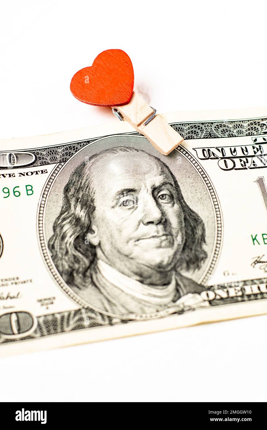 Dollar and a heart on a white background. Love for money, donations ...