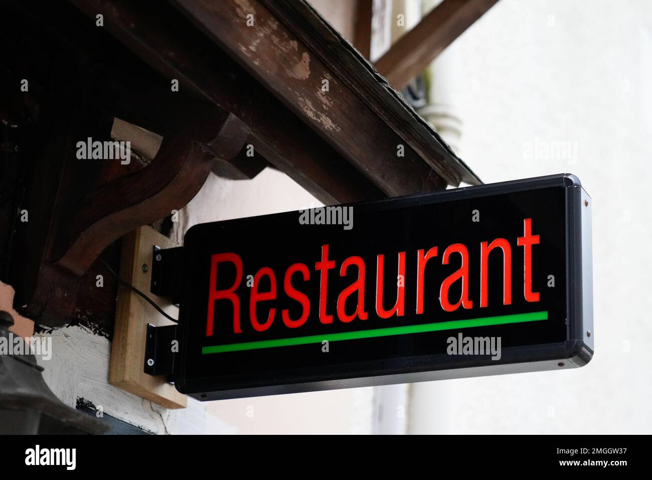 restaurant text sign on facade building cafe pub in street Stock Photo ...