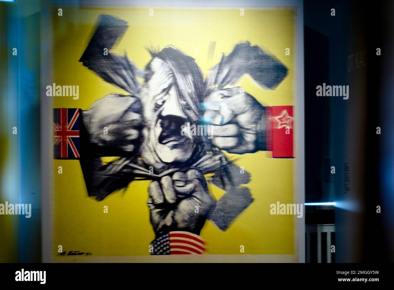 In this photo taken through a window, a Soviet WW II drawing depicting ...