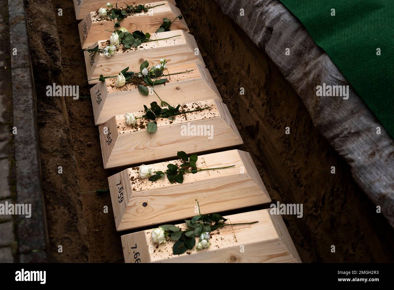 In this Wednesday, Oct. 2, 2019 photo, small coffins with the remains ...