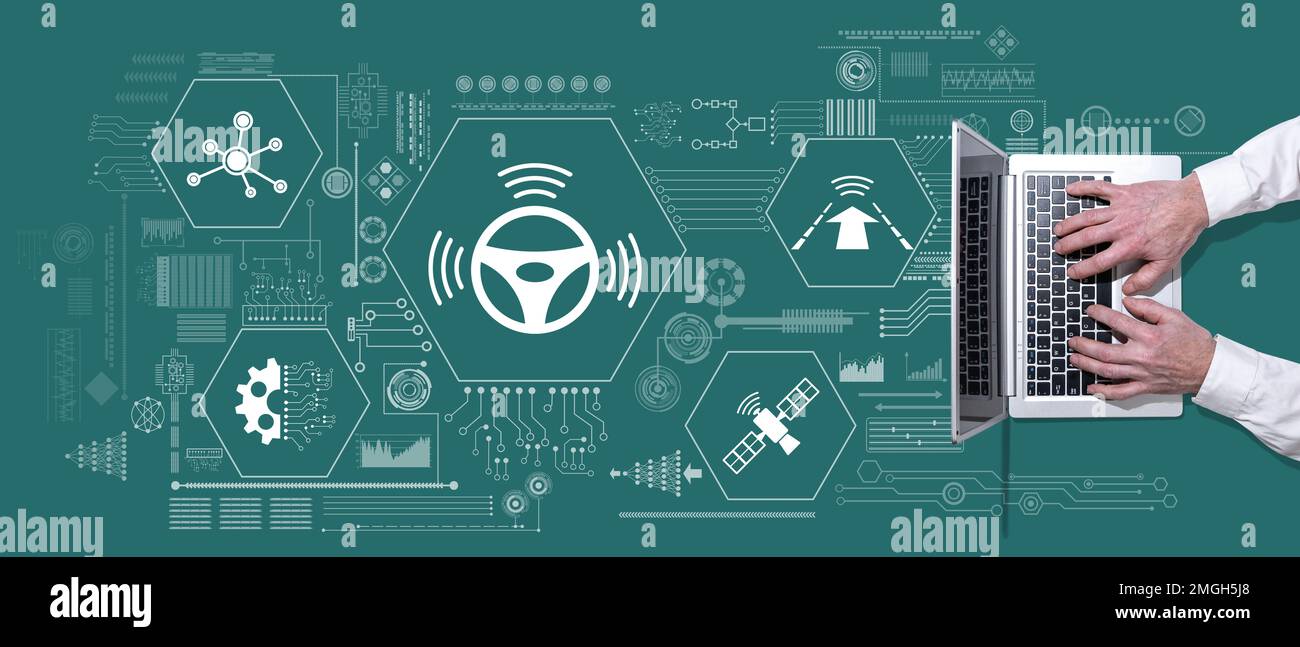 Top view of hands using laptop with symbol of self-driving car concept ...