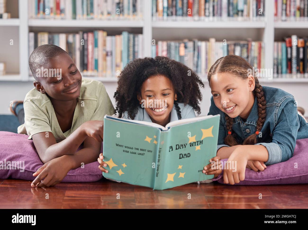 Children in library, reading book and learning, education and story for ...