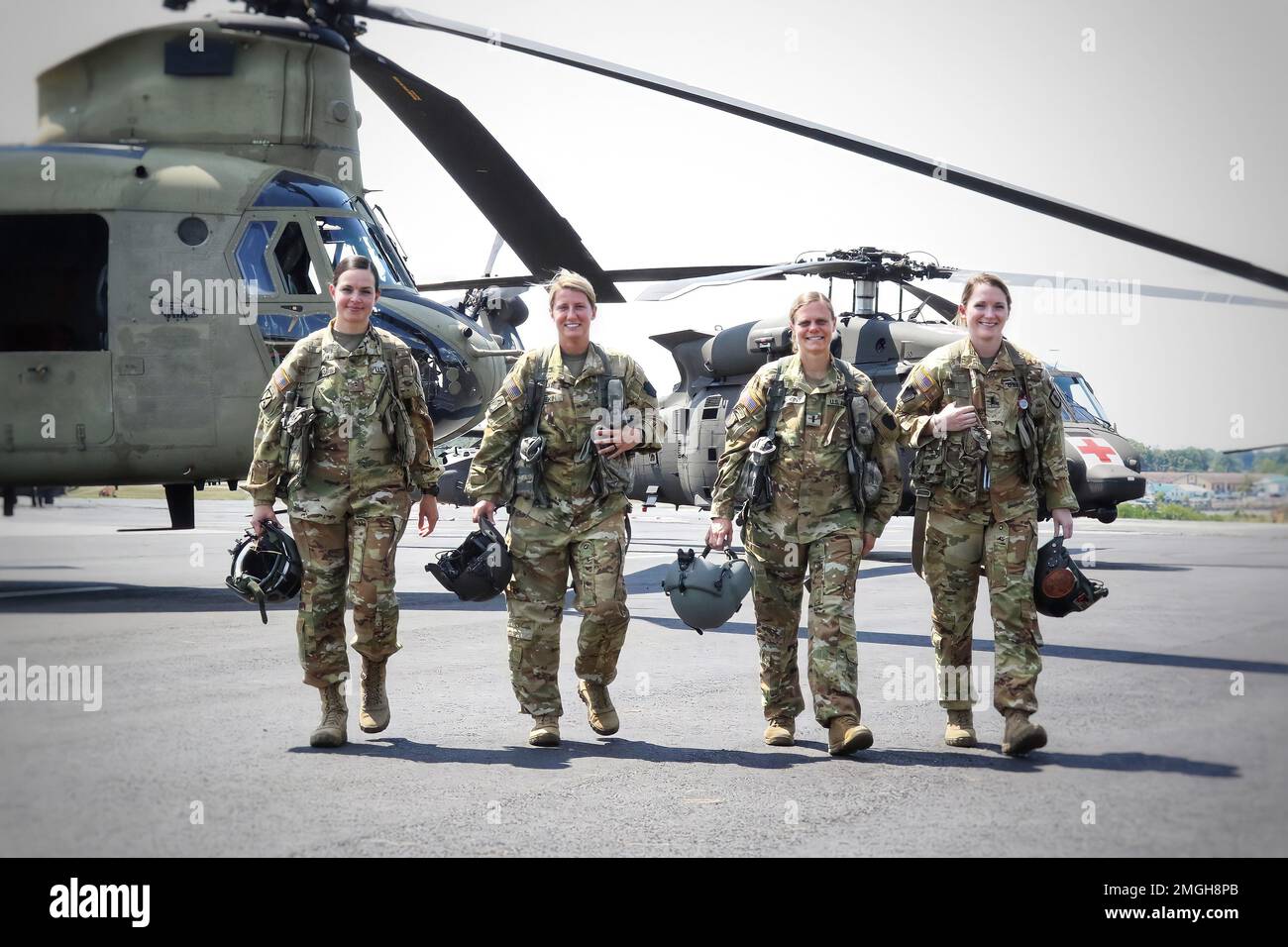From left, Chief Warrant Officer 2 Tracy Ackermann, Maj. Kandy Heekin ...