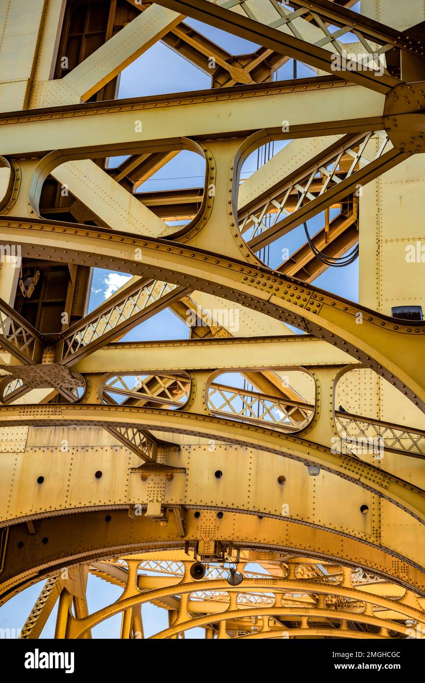 Arched truss pedestrian and transportation Golden Bridge with marked ...