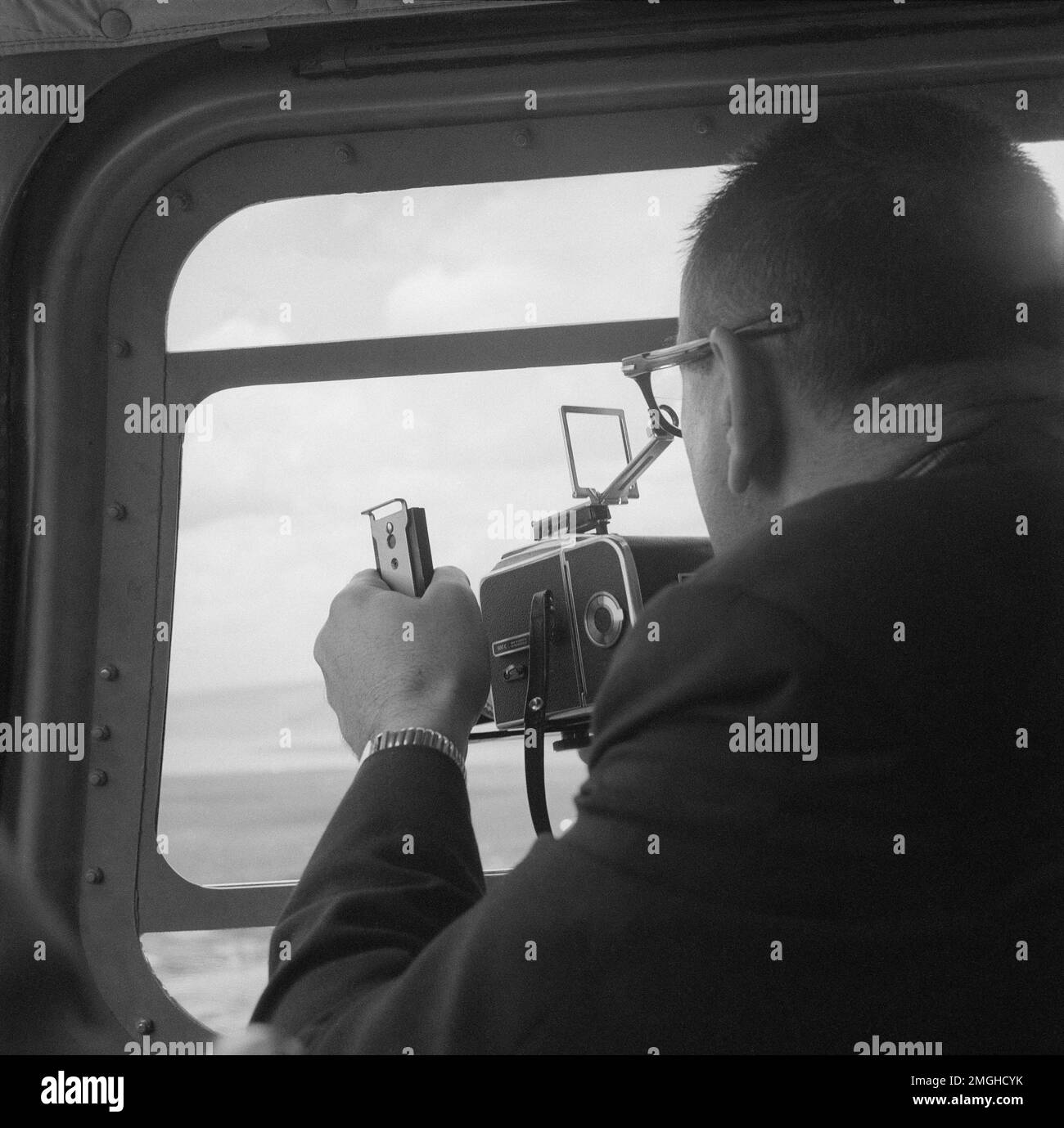 Associated Press staff photographer Murray Becker of New York, shoots ...