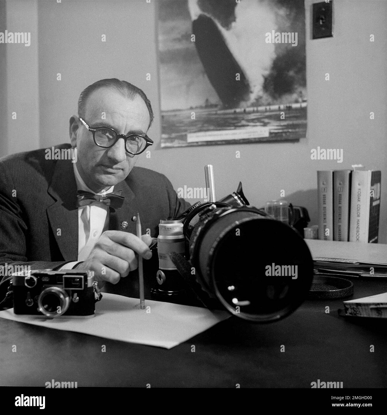 Associated Press chief photographer Murray Becker is pictured with two ...