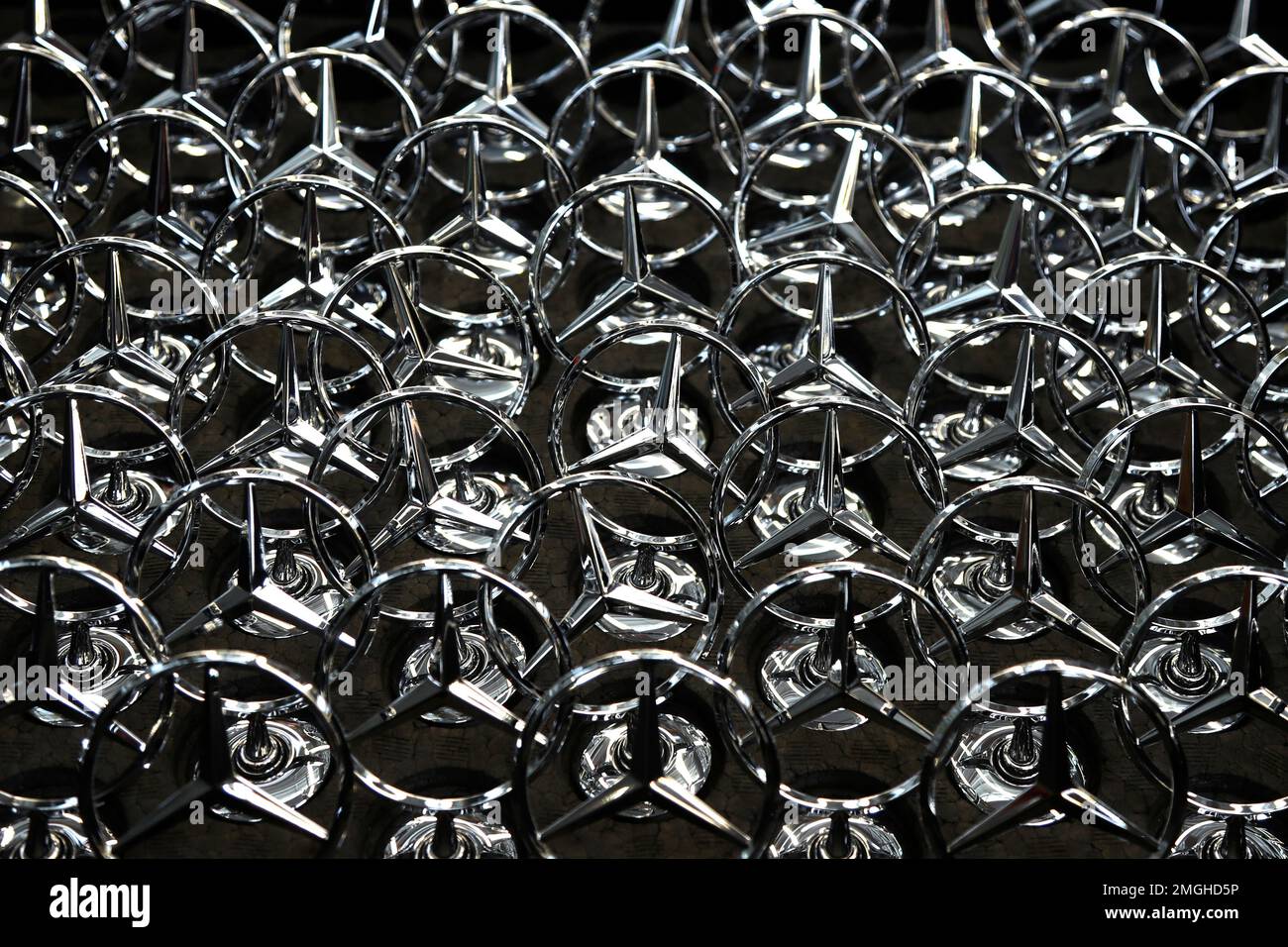 Mercedes-Benz car emblems are ready to be attached to S-class models at ...