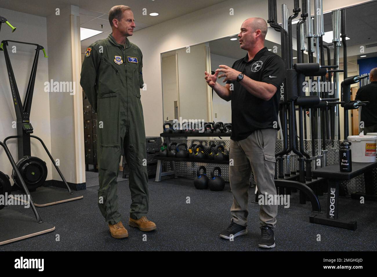 Maj. Gen. Corey Martin, 18th Air Force commander, speaks with Aaron ...