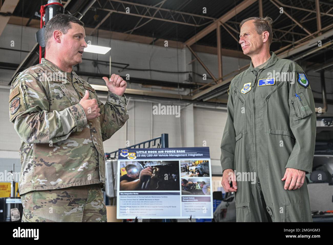 Maj. Gen. Corey Martin, 18th Air Force commander, speaks with Maj ...