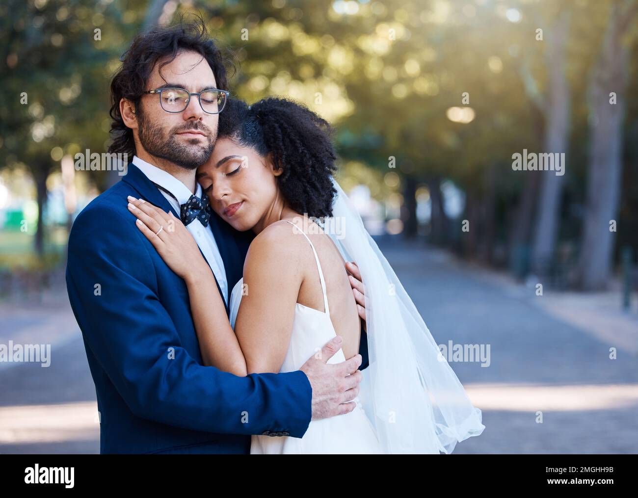 Wedding, bride and groom hug with love, care and celebration in outdoor ...