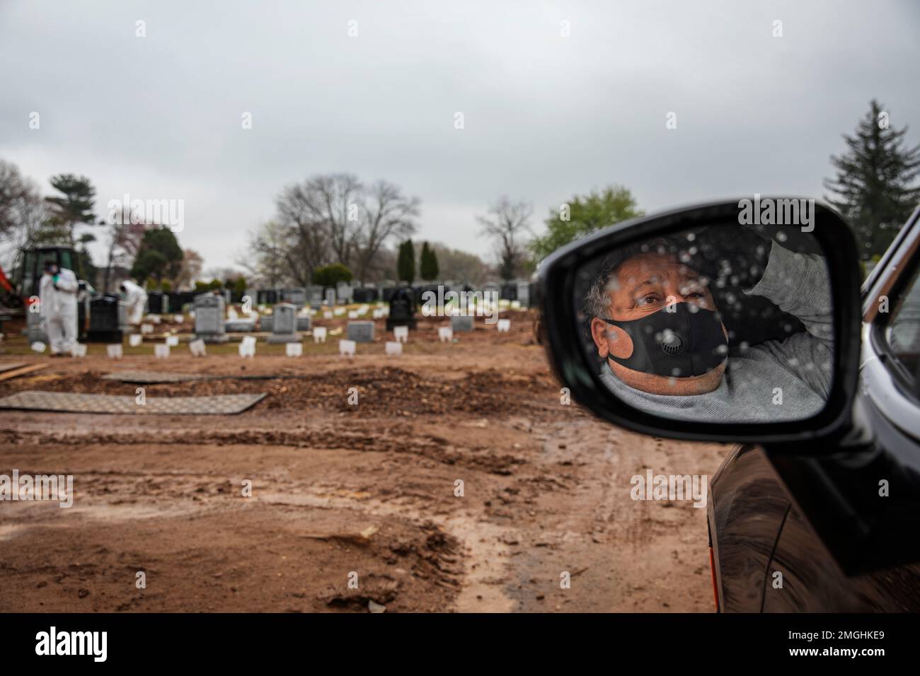 Michael Tokar observes from his car as his father, David Tokar, is ...