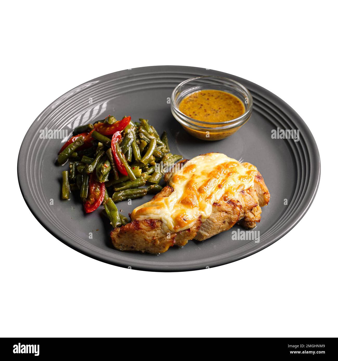Turkey fillet under mozzarella cheese with green beans Stock Photo - Alamy