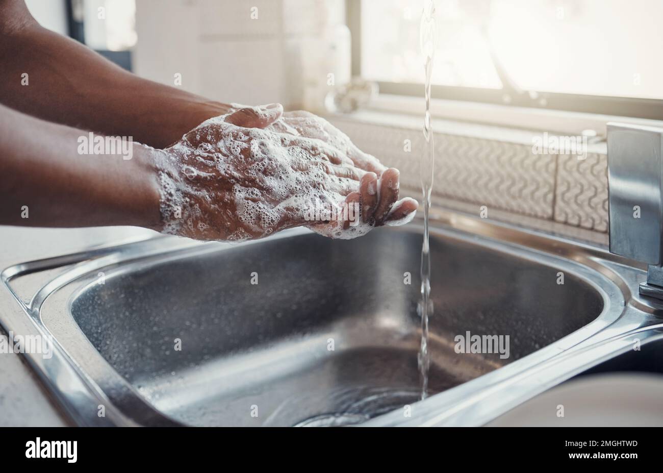 Cleaning, washing hands and kitchen sink with soap for health, home ...