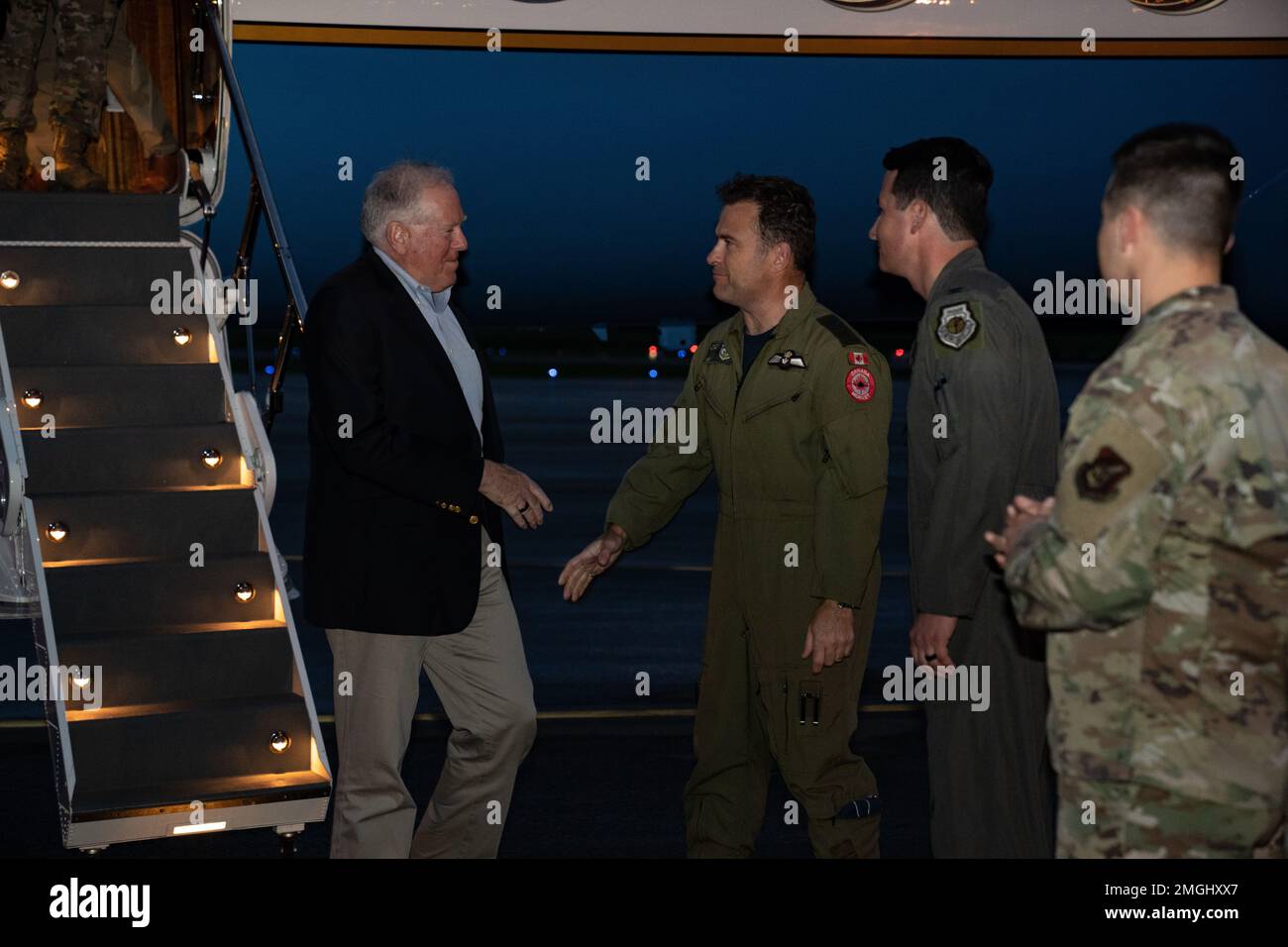 Secretary of the Air Force Frank Kendall, left, is greeted by Canadian ...