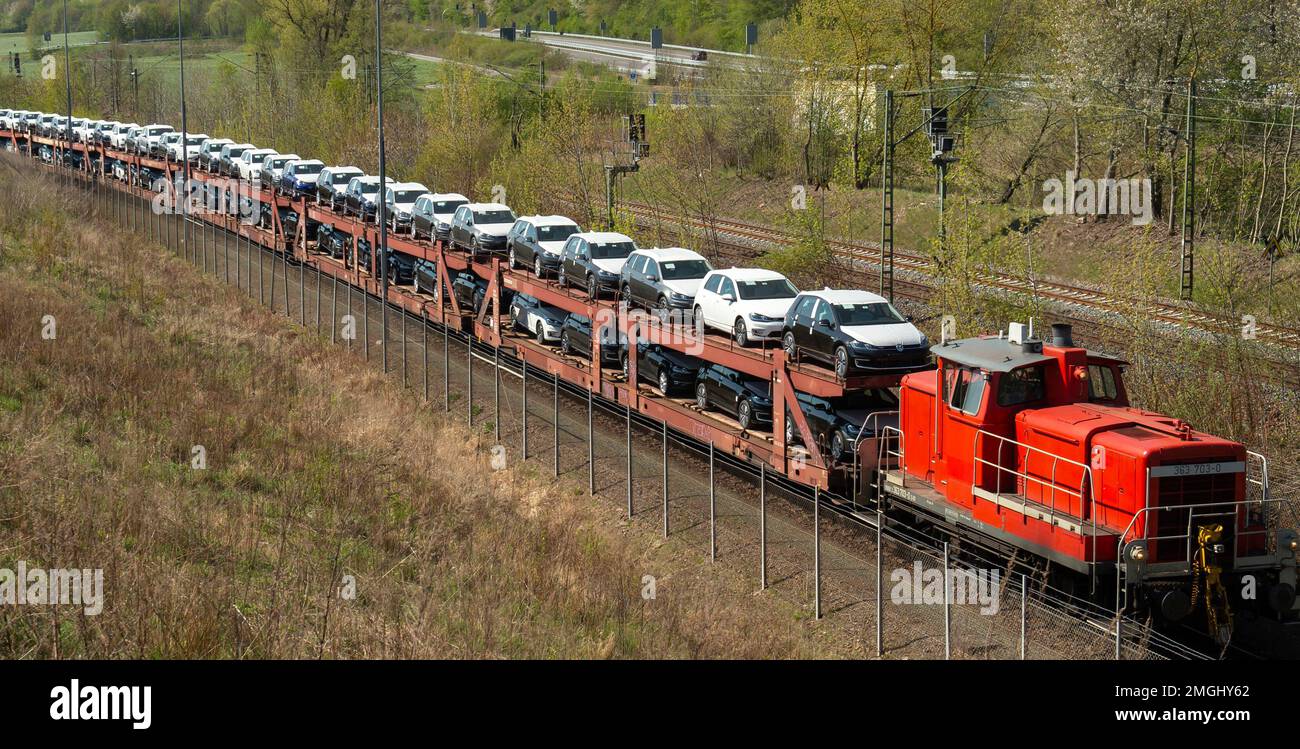 A train transports new Volkswagen cars during the production restart of ...