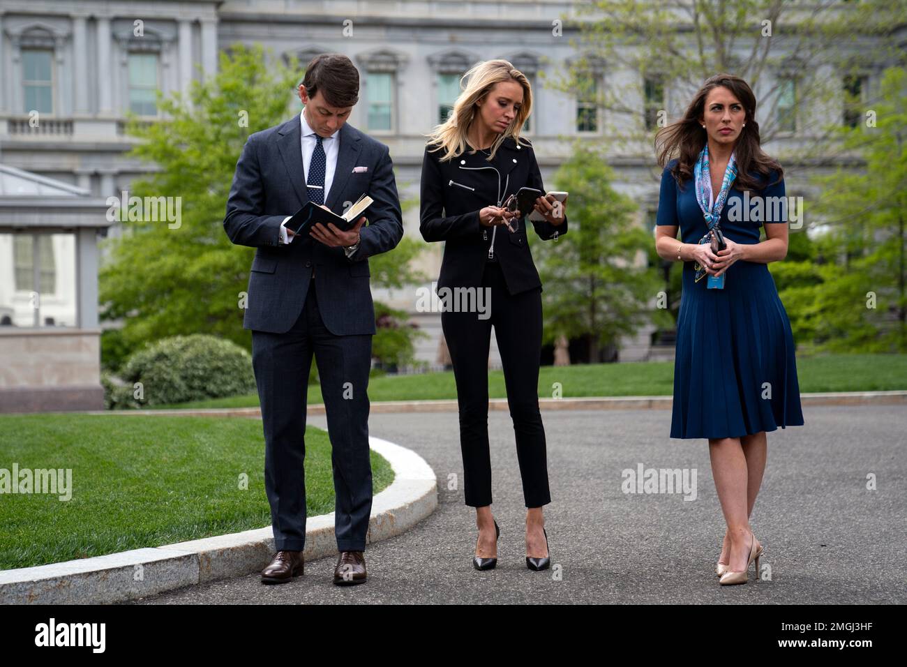 White House deputy press secretary Hogan Gidley, left, White House press secretary Kayleigh ...