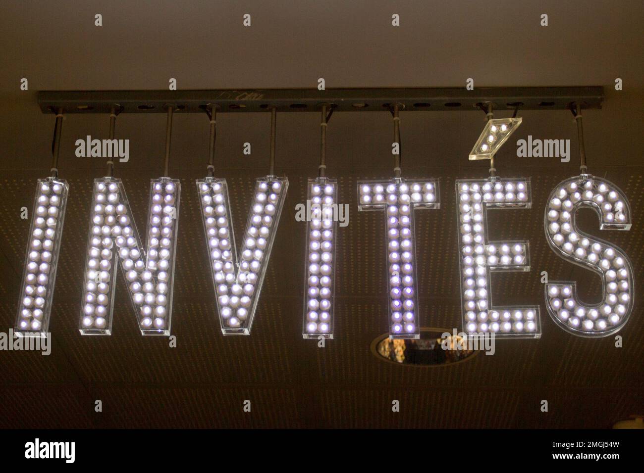 vip signboard write invites in french means guests in english in bright ...