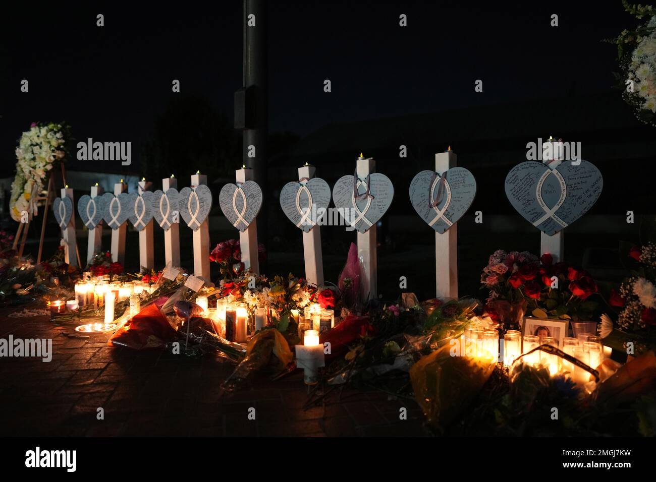 Wooden hearts with the names of mass shooting victims Valentino Marcos ...