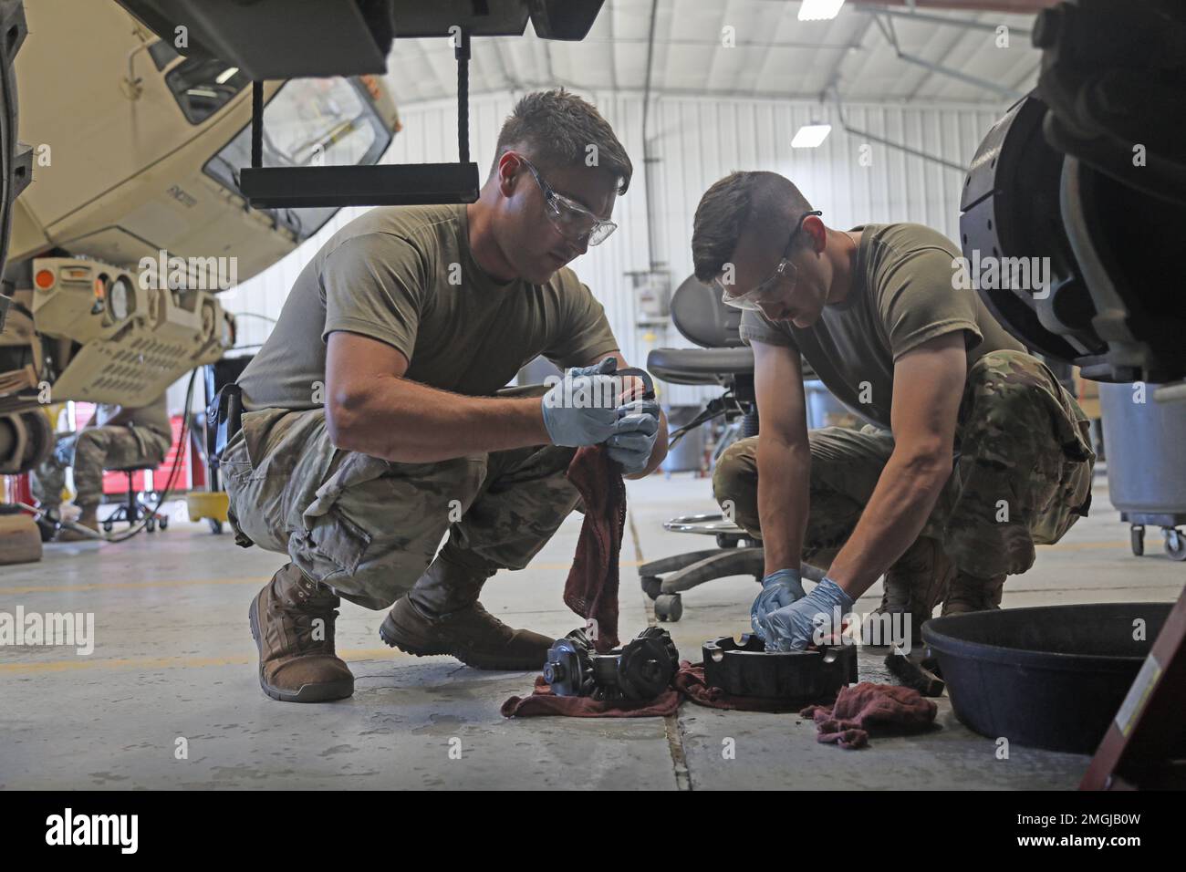 U.S. Army Reserve Spc. Joshua Knier, left, assigned to the 996th ...