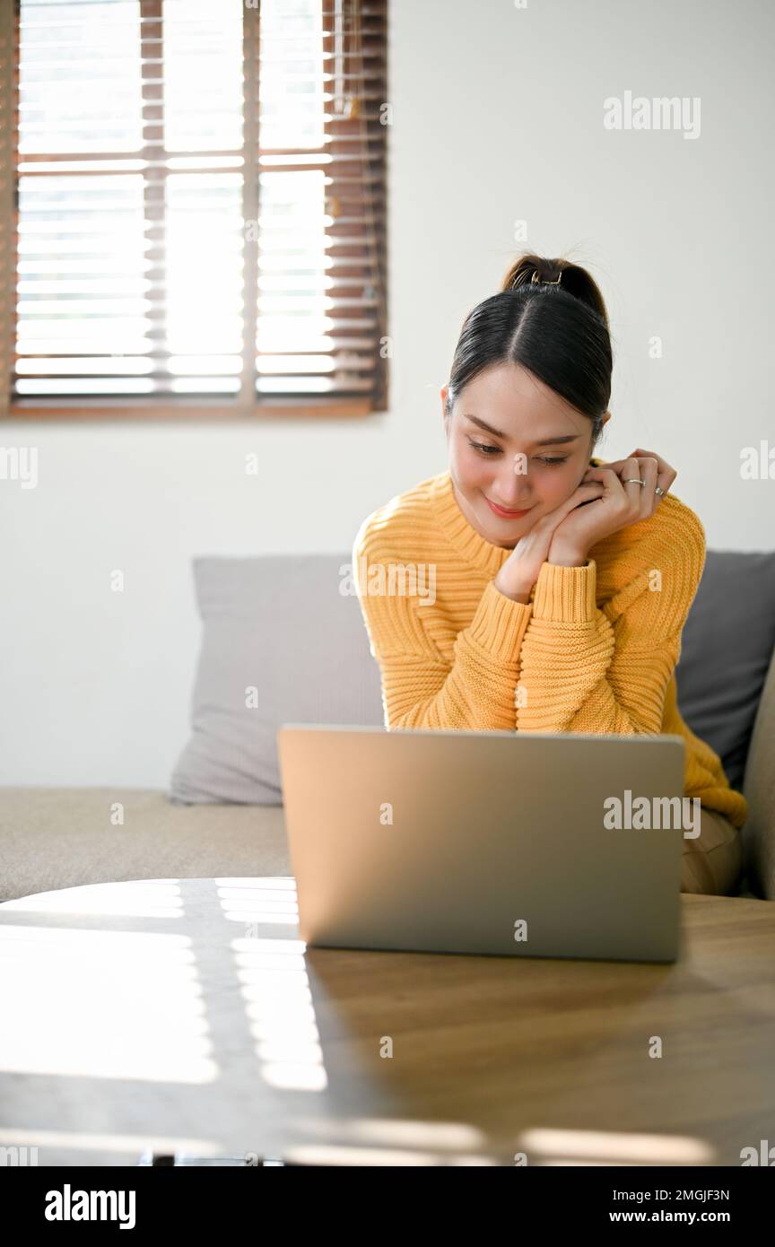 Portrait, Charming millennial Asian woman or female freelancer working ...