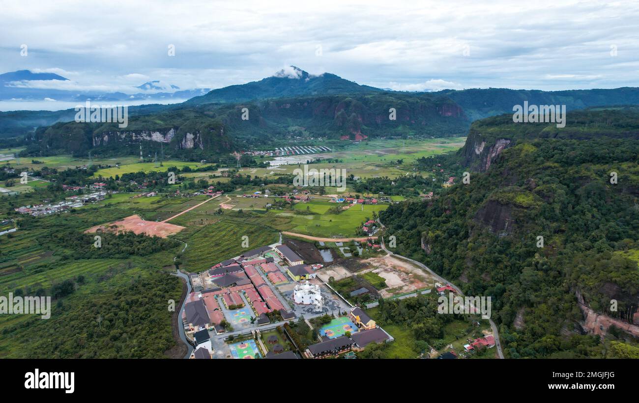 Indonesian village with mountains in background hi-res stock ...
