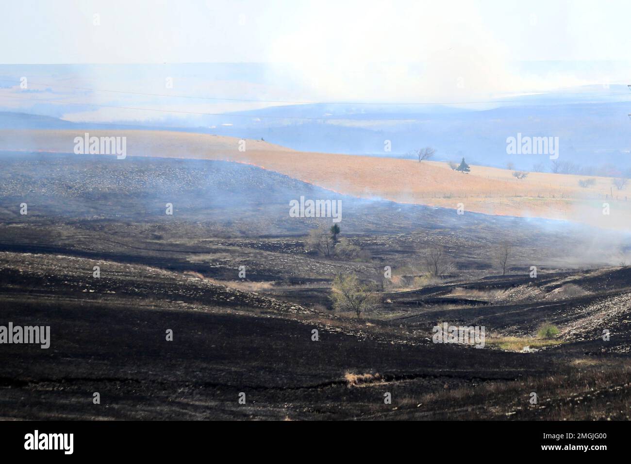 Smoke from controlled prairie fires fill the sky near Belvue, Kan ...
