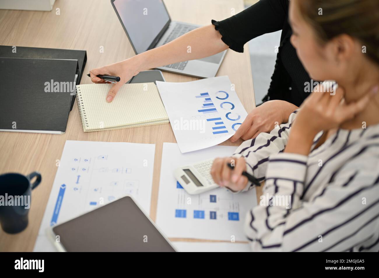 Top view of a Business financial team discussing and brainstorming ...