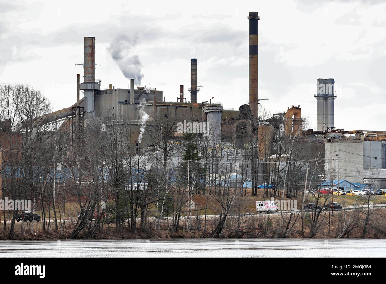 An ambulance arrives at the Androscoggin Mill after an explosion at the ...