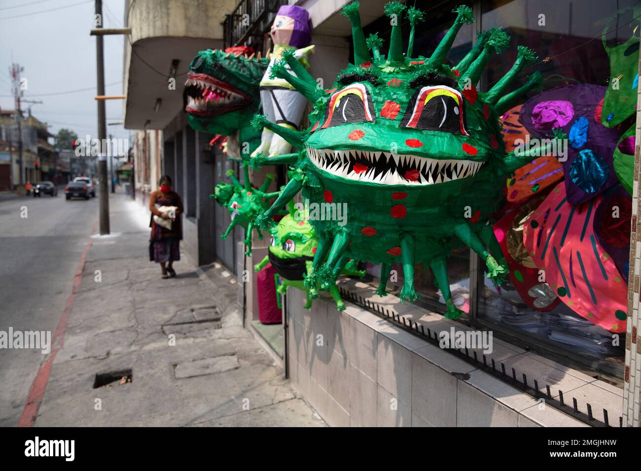 Piñatas depicting the new coronavirus are displayed in a store at Colon ...
