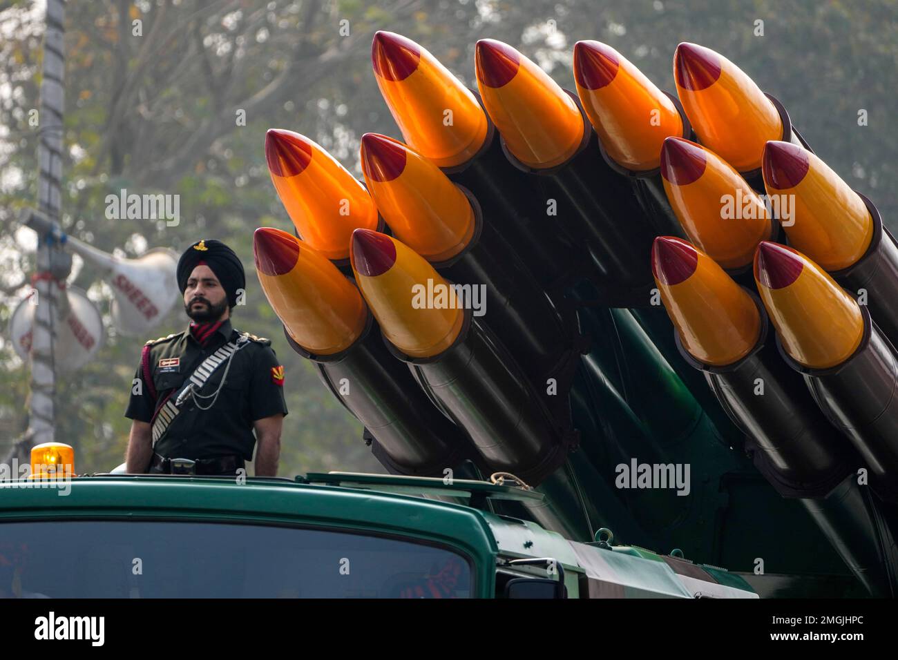 An Indian army soldier stands next to 300mm SMERCH MLRS as it rolls ...