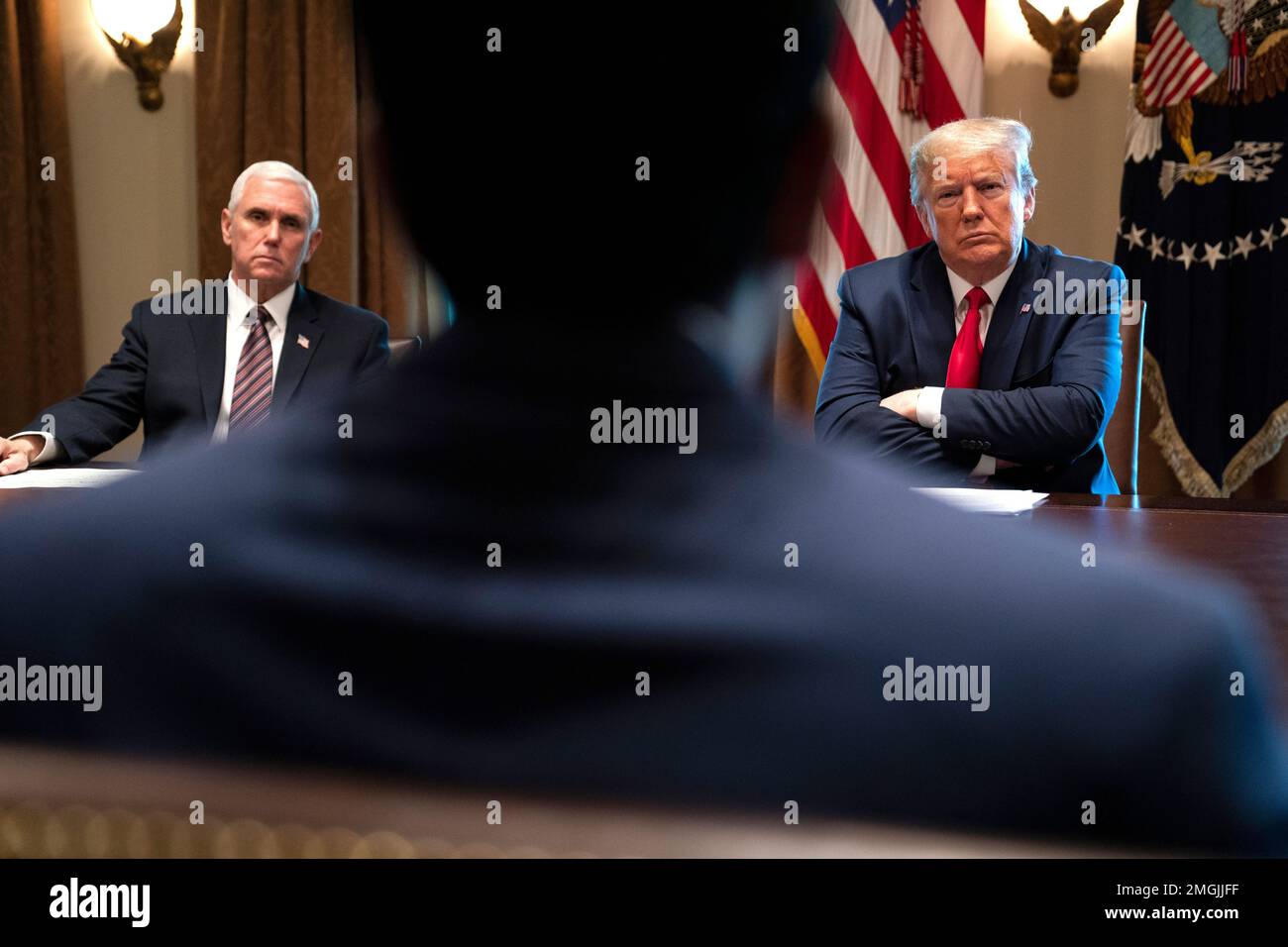 Vice President Mike Pence and President Donald Trump listen as people ...