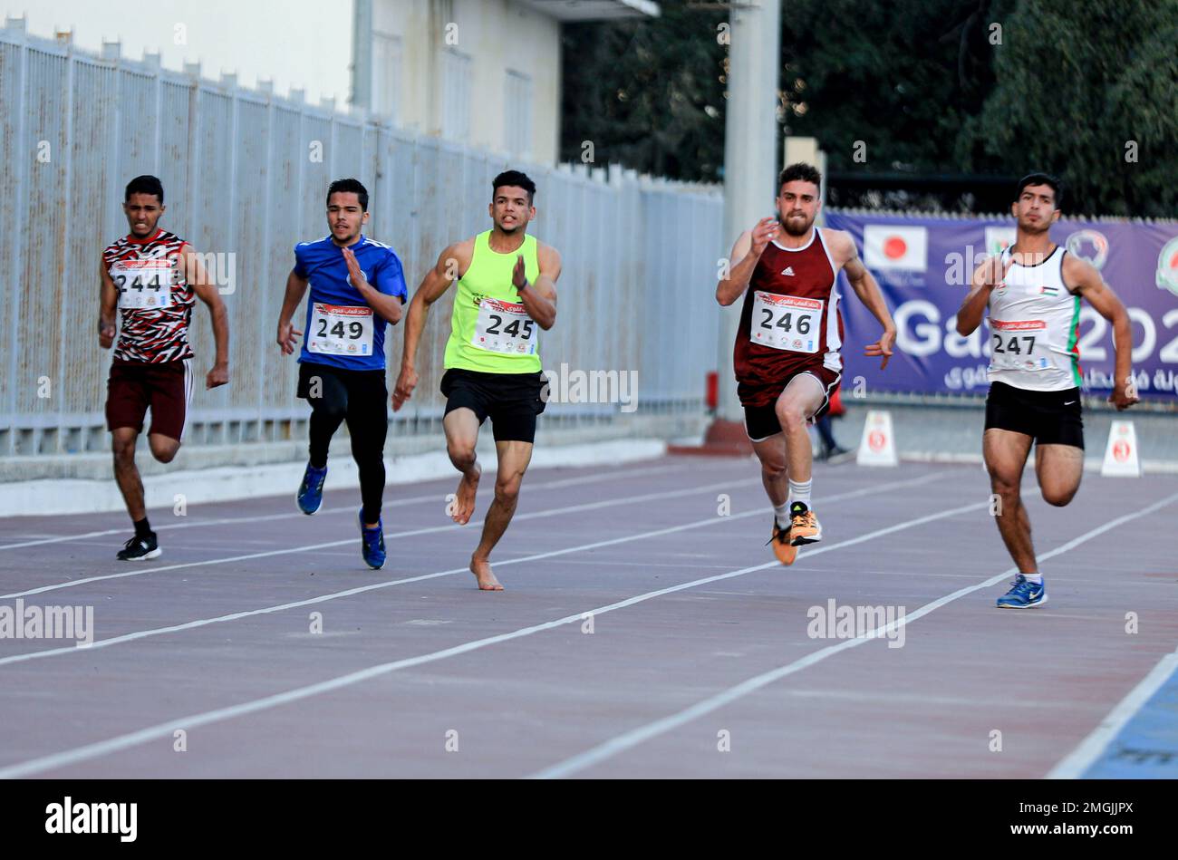Palestinian athletes compete in the 100-meter race within the Palestine ...