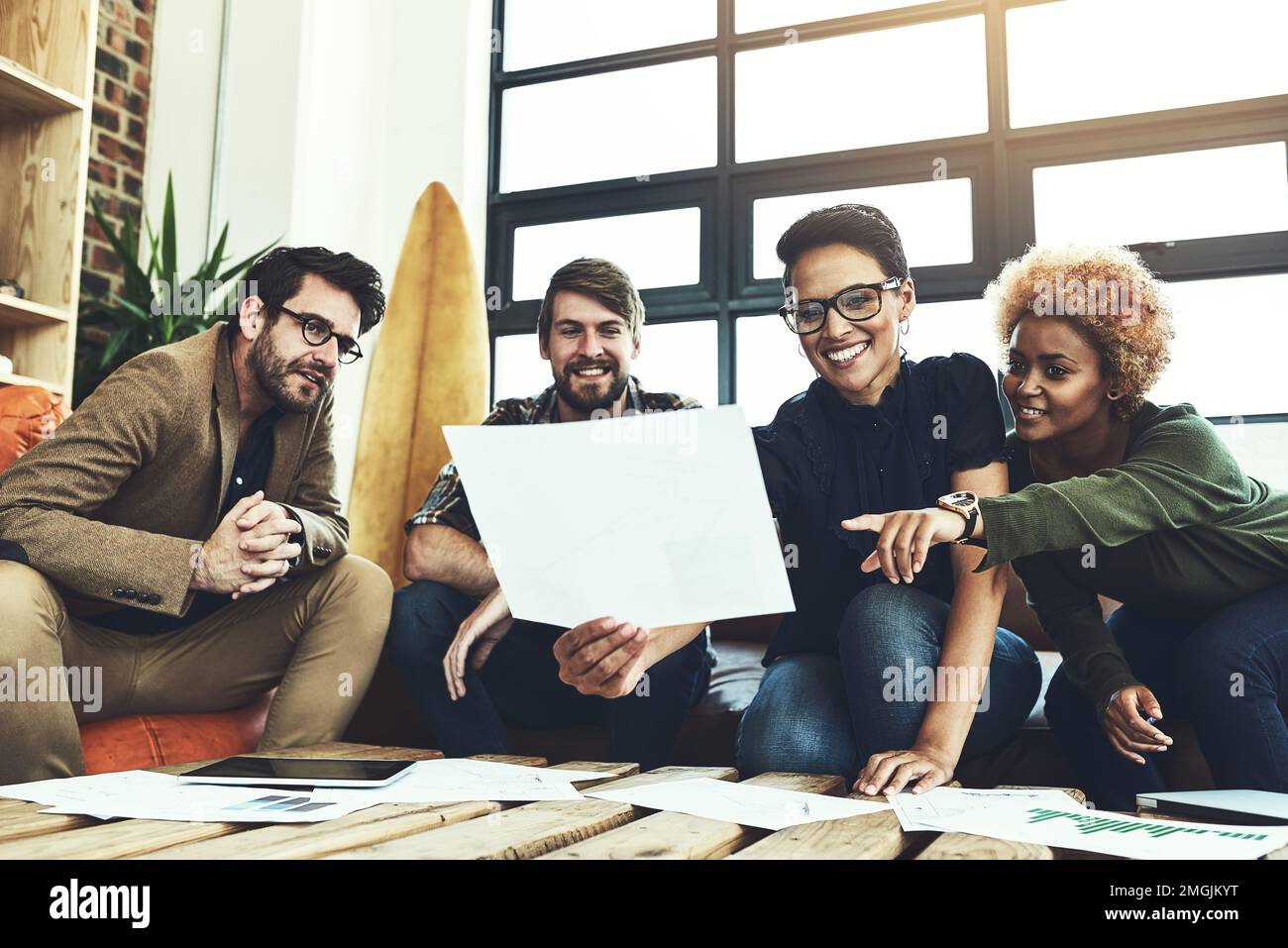 Brainstorming is a creative gold mine. a group of young designers ...