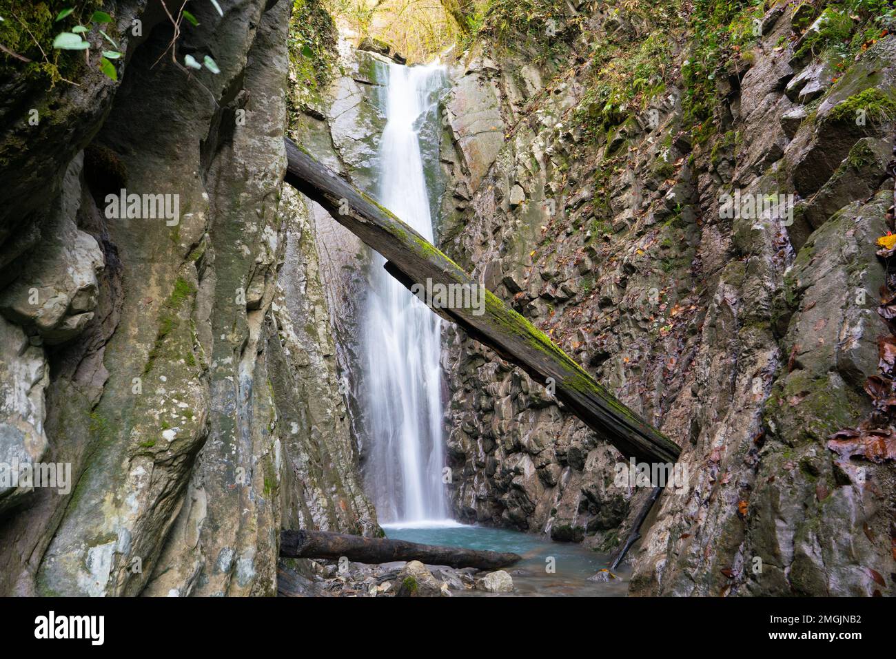 Beautiful view of waterfall landscape. Small waterfall in deep green ...