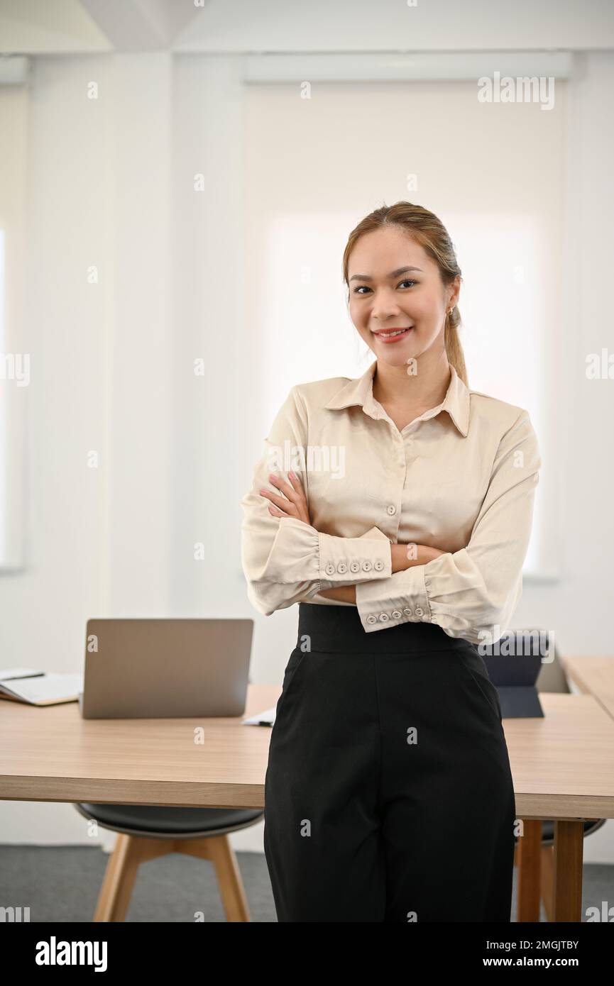 Portrait, Attractive and successful millennial Asian businesswoman or ...