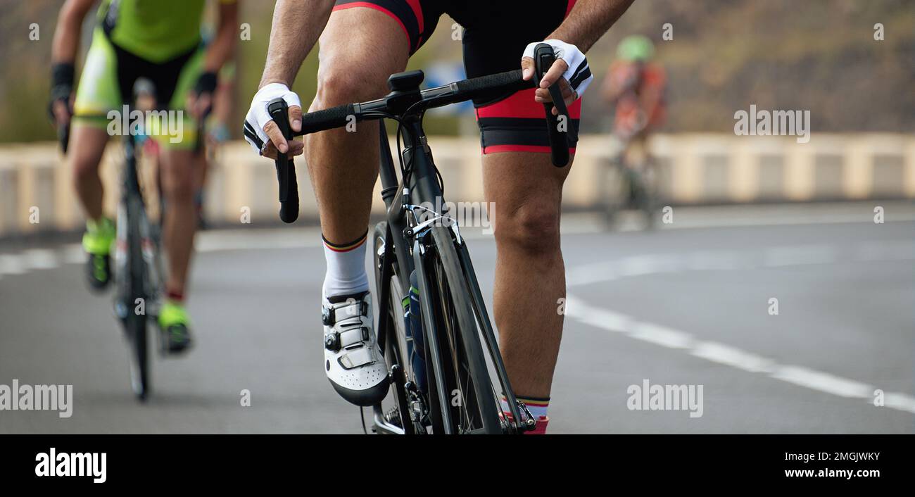 Cyclists with racing bikes during the cycling road race Stock Photo - Alamy