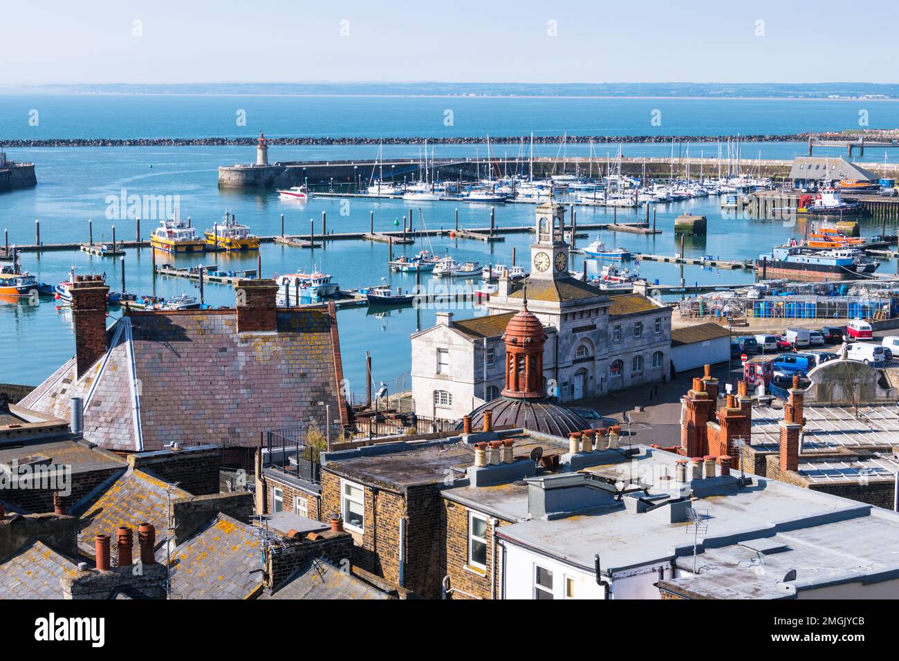 View towards Royal Harbour and West Pier lighthouse, Ramsgate, Kent ...