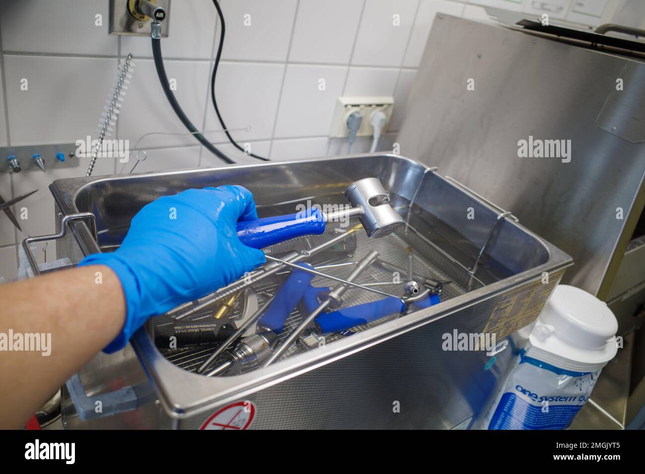 various surgical instruments are cleaned in an ultrasonic bath Stock ...
