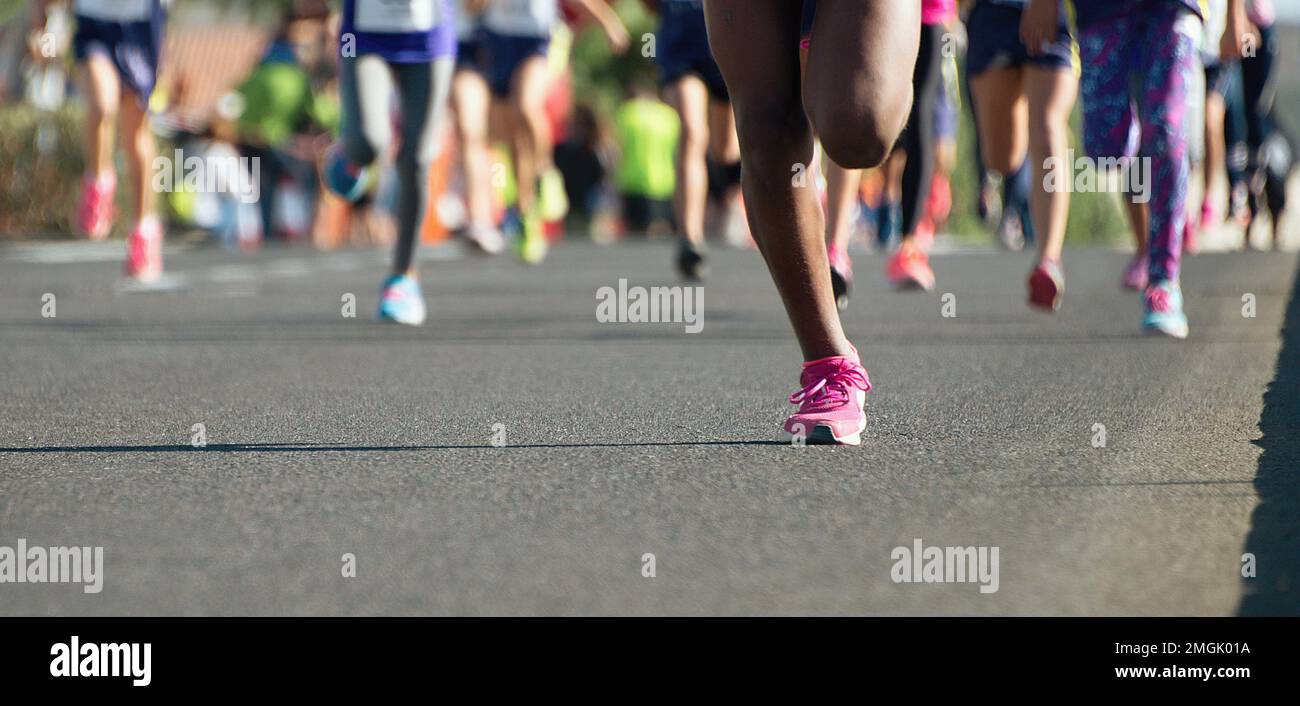 Running children, young athletes run in a kids run race Stock Photo - Alamy