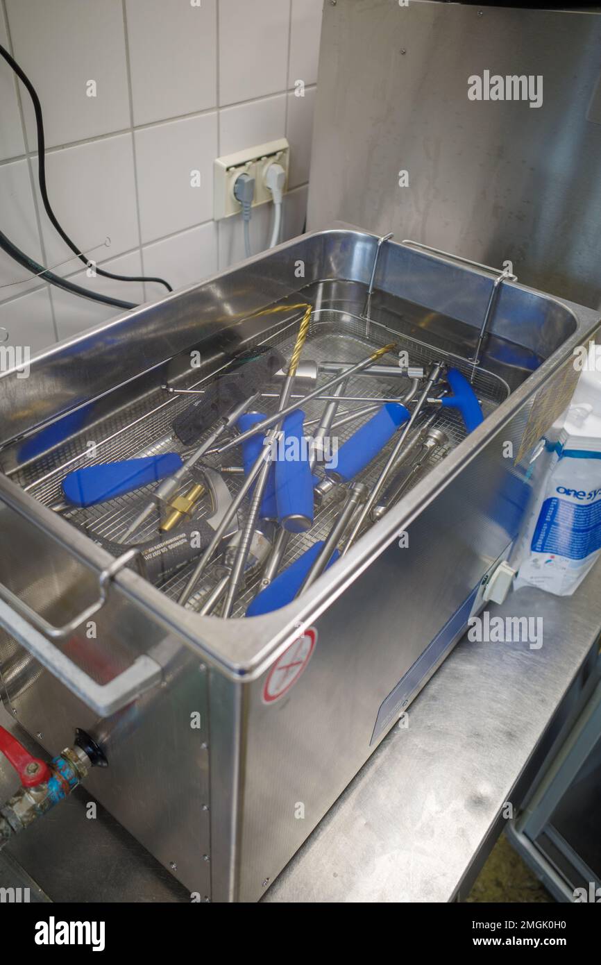 various surgical instruments are cleaned in an ultrasonic bath Stock ...