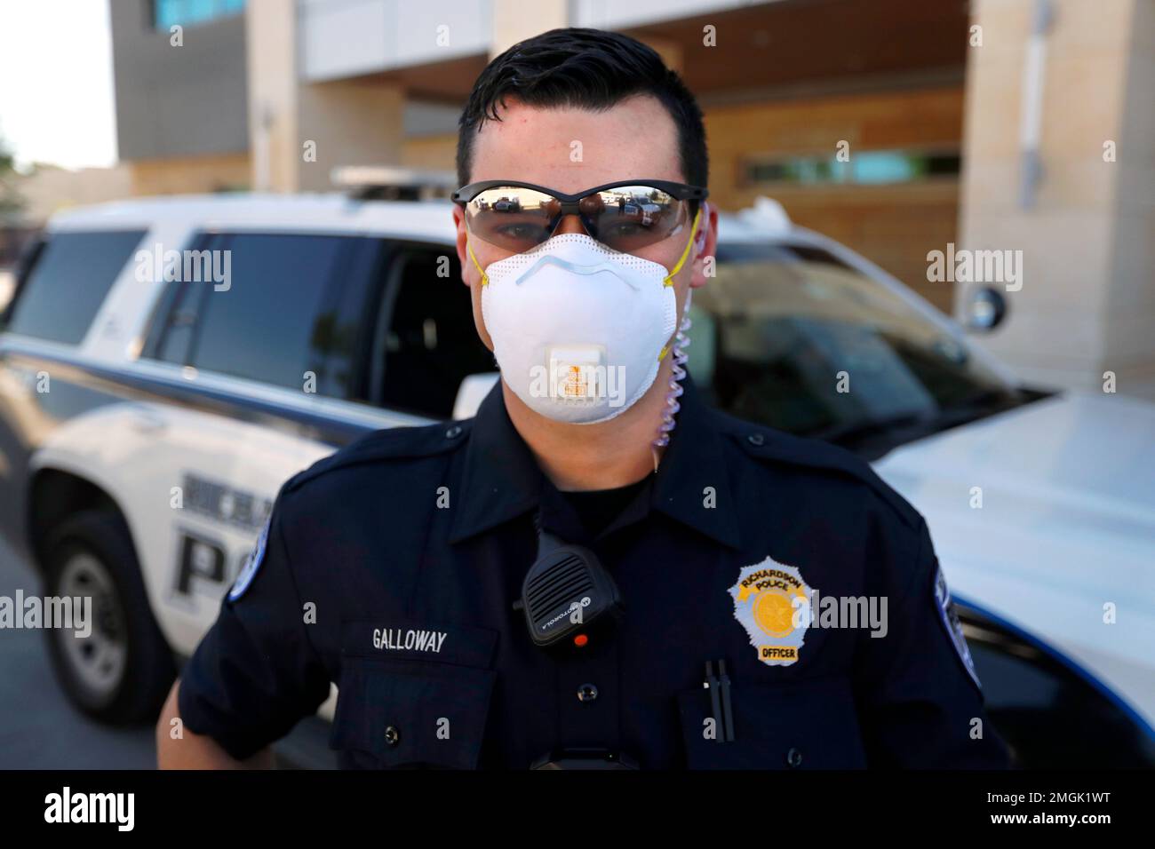 Richardson police officer Austin Galloway poses for a photo outside his ...