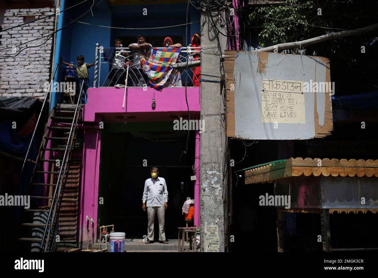 A message which reads, "Lockdown, Stay at Home, Stay Safe" hangs from a ...