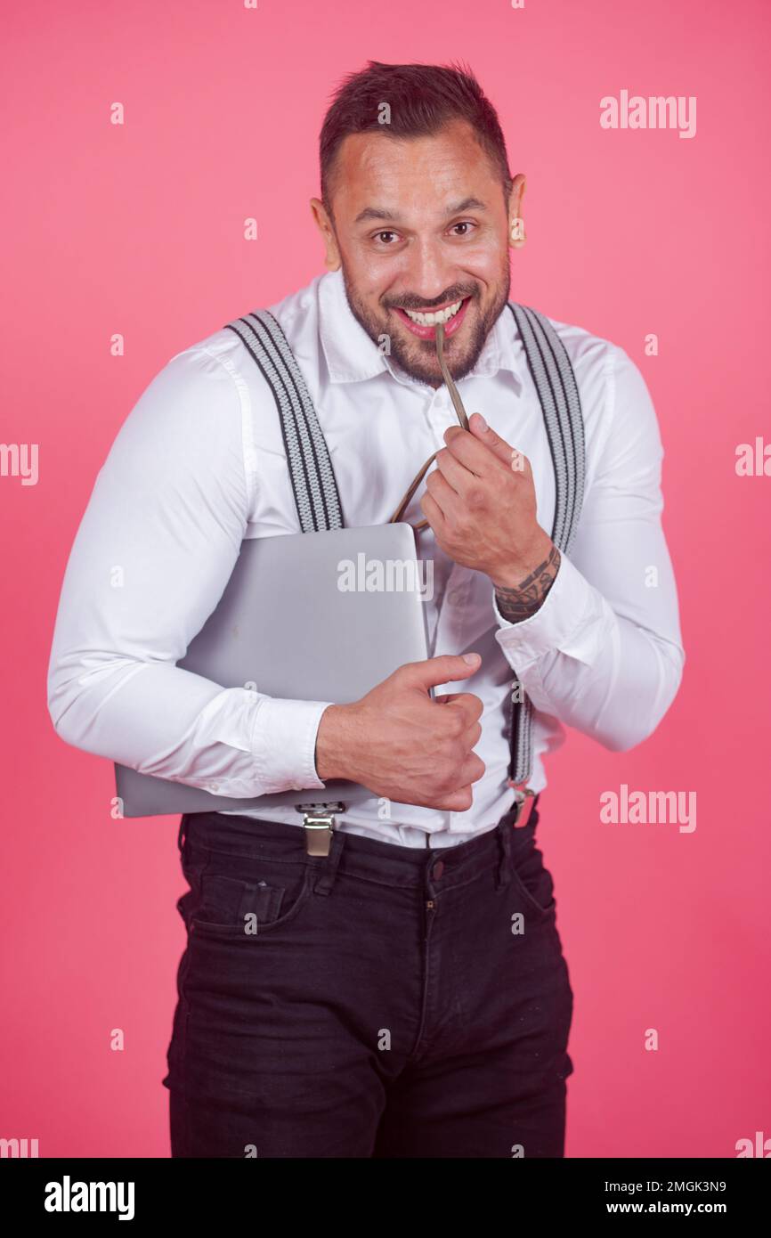 Funny and crazy man with laptop. Portrait of funny funky crazy man with ...