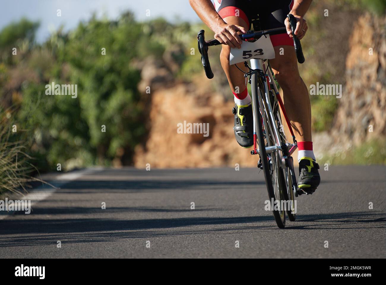 Road bike cyclist man cycling,athlete on a race cycle, set is checked ...