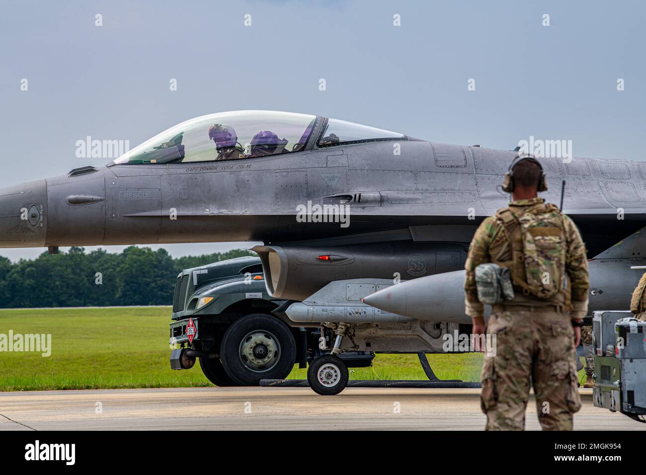 A U.S. Air Force Airman assigned to Shaw Air Force Base looks on during ...